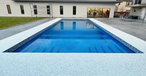 Dynamic Resurfacing Installs New Pool Deck and Garage Floor Concrete ...